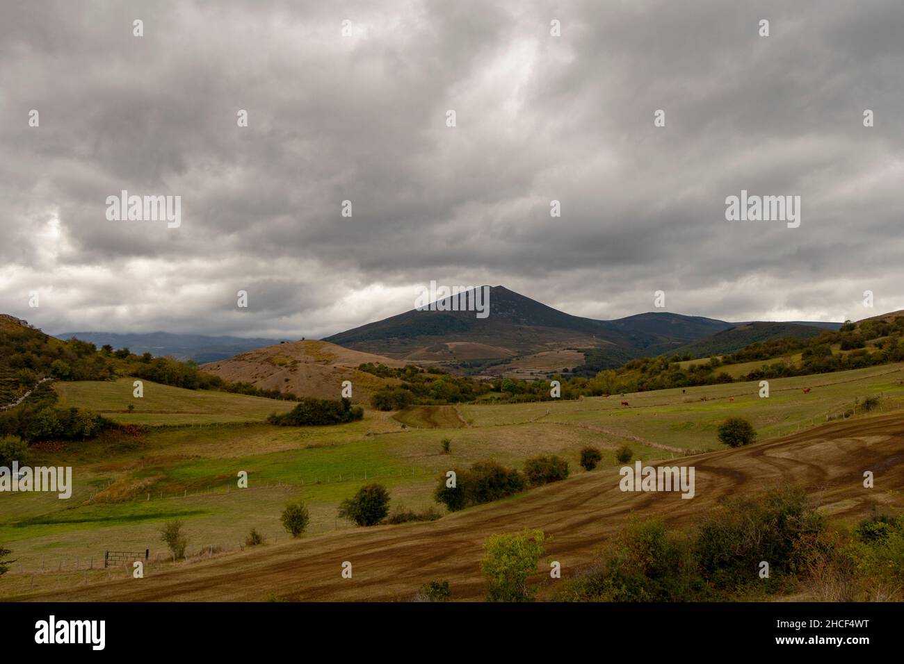 A beautiful country landscape under a gloomy sky Stock Photo - Alamy