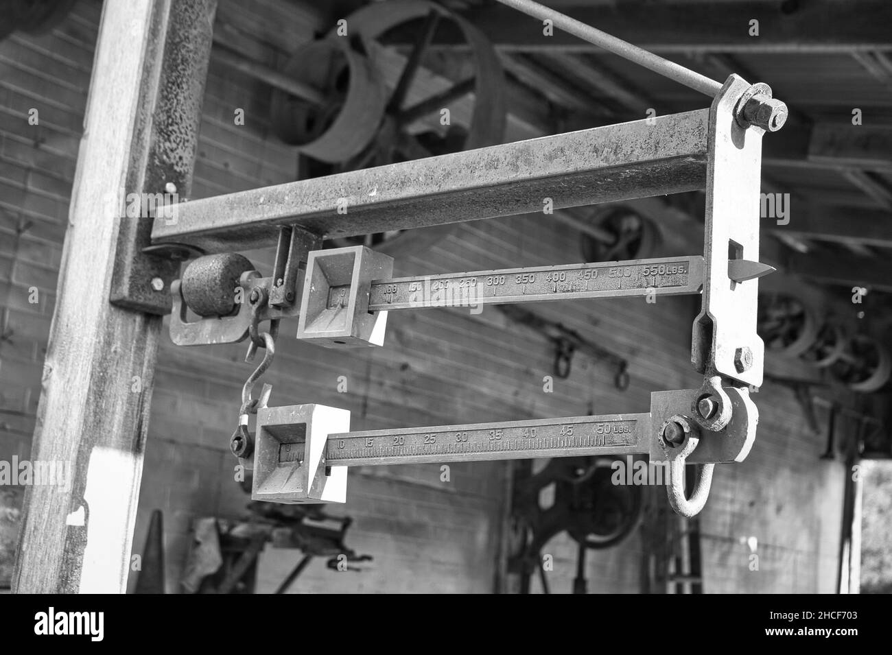 Grayscale of an old scale in the farm Stock Photo - Alamy