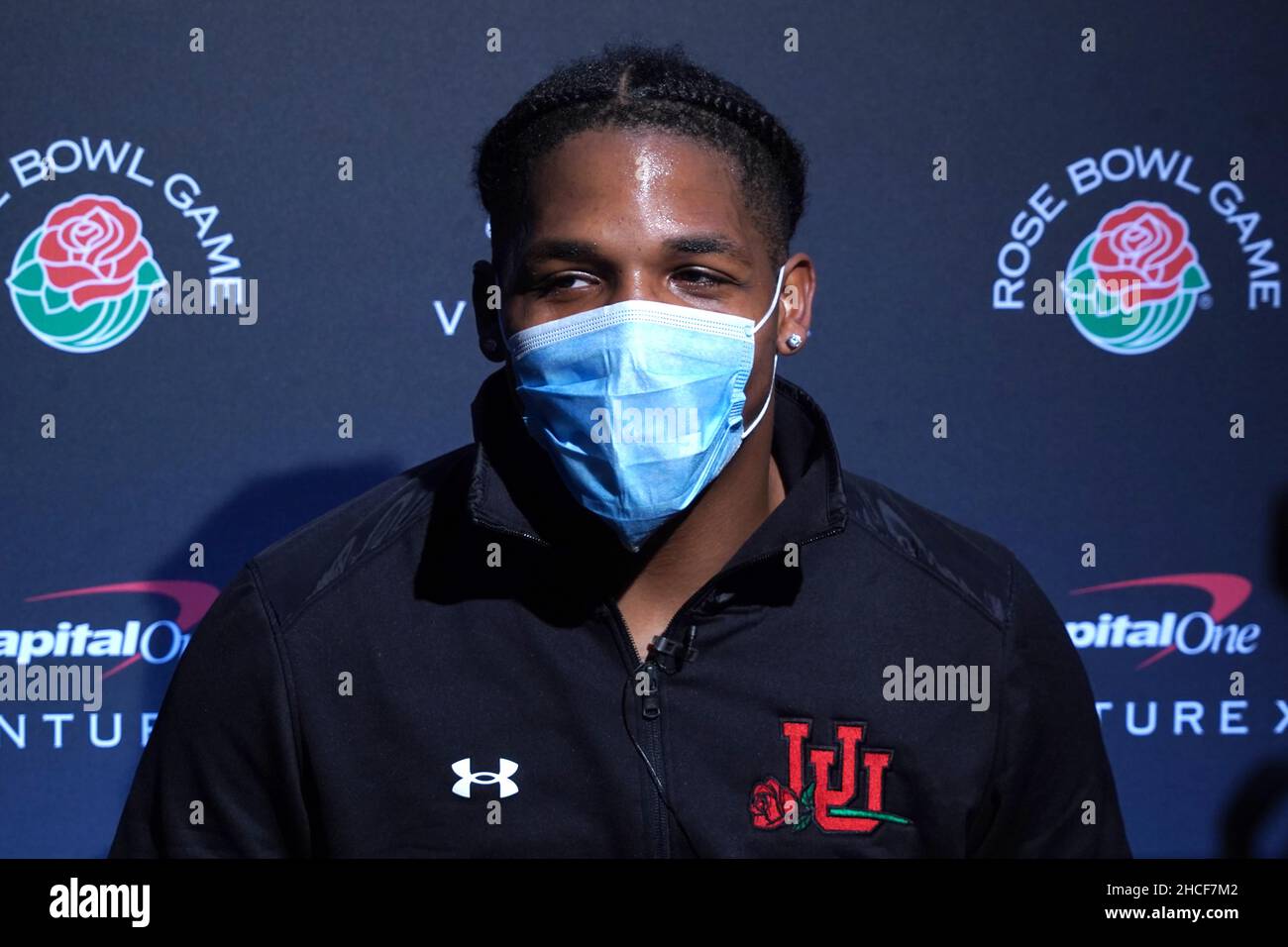 Utah Utes running back Tavion Thomas wears a face mask at a press ...