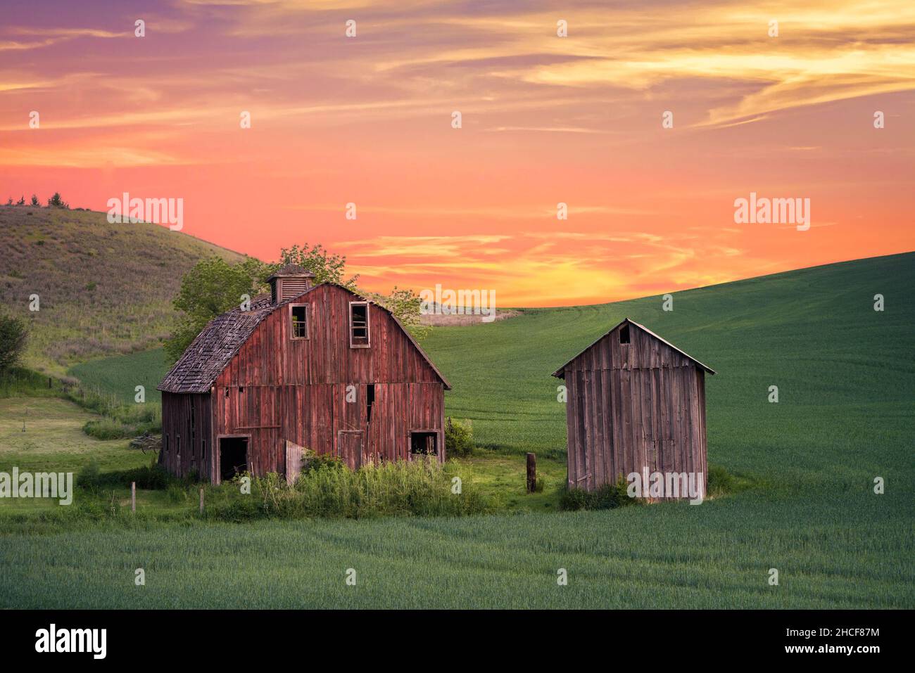 Rural farm scene at sunset with red barn viewed from the Palouse in ...
