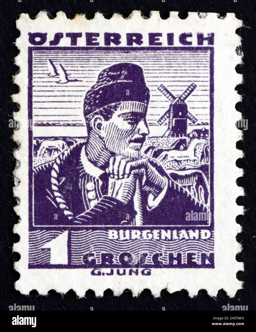 AUSTRIA - CIRCA 1934: a stamp printed in the Austria shows Man from ...