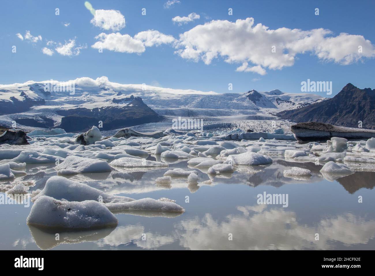 Beautiful glacier melting in an ice lagoon with icebergs Stock Photo ...