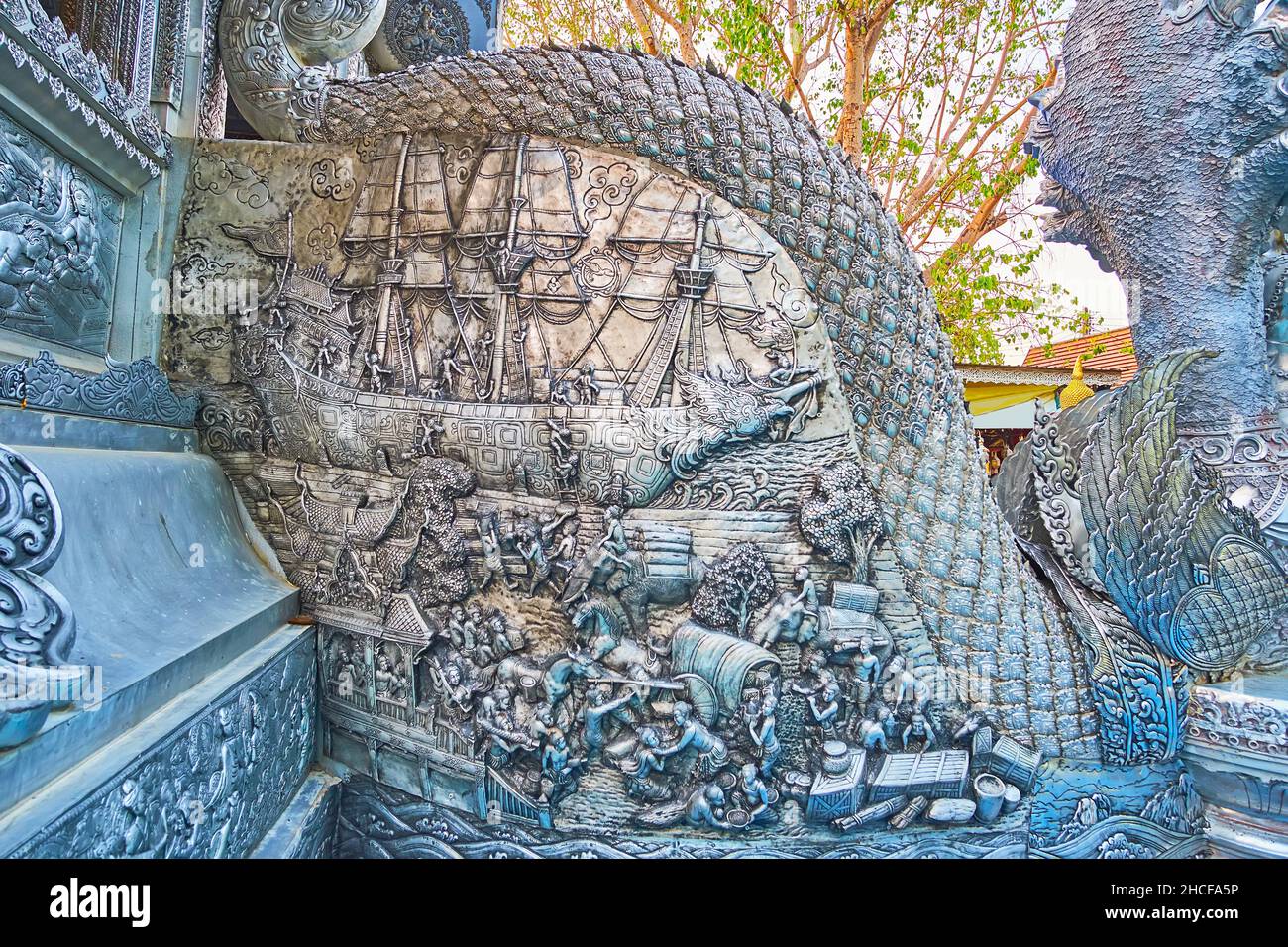The chased metal panel of the handrail of Silver Temple (Wat Sri Suphan ...
