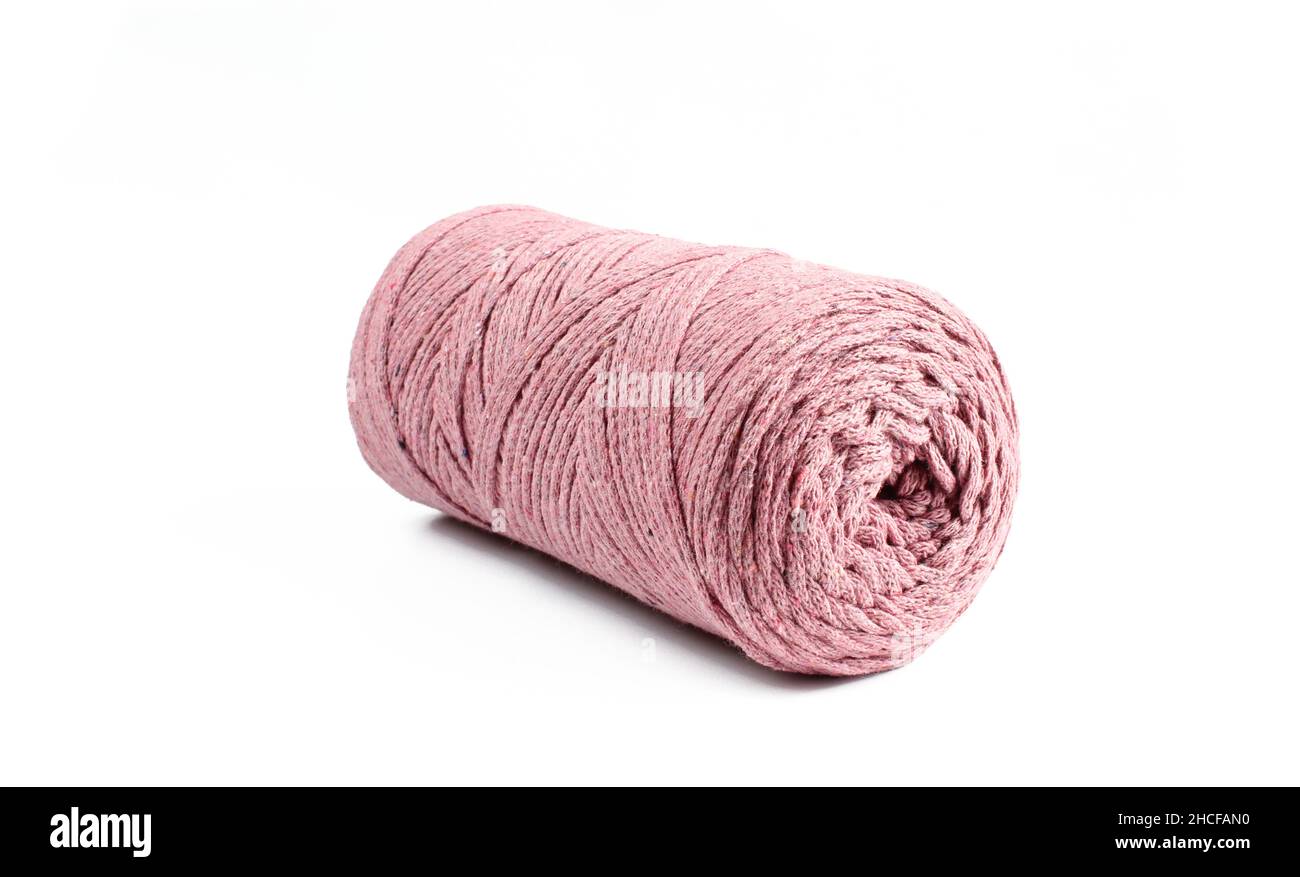 Roll of pink thread for knitting isolated on white background. Macrame ...