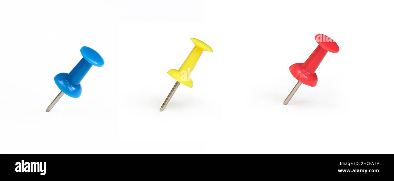 Red,yellow and blue push pin isolated on white background Stock Photo ...