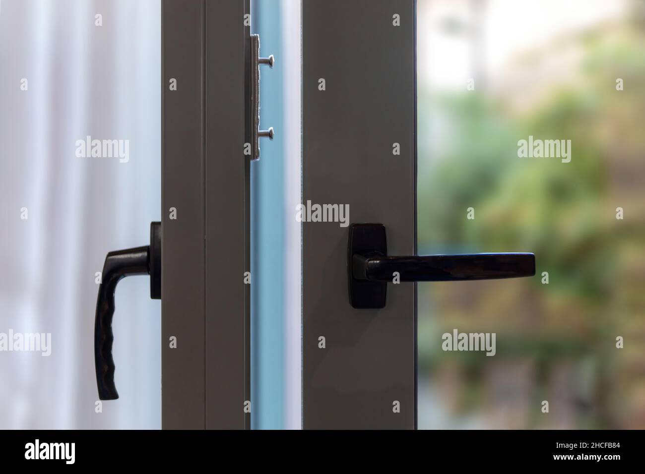 Metal glass window and handle detail. Two sliding aluminum frame, doors ...