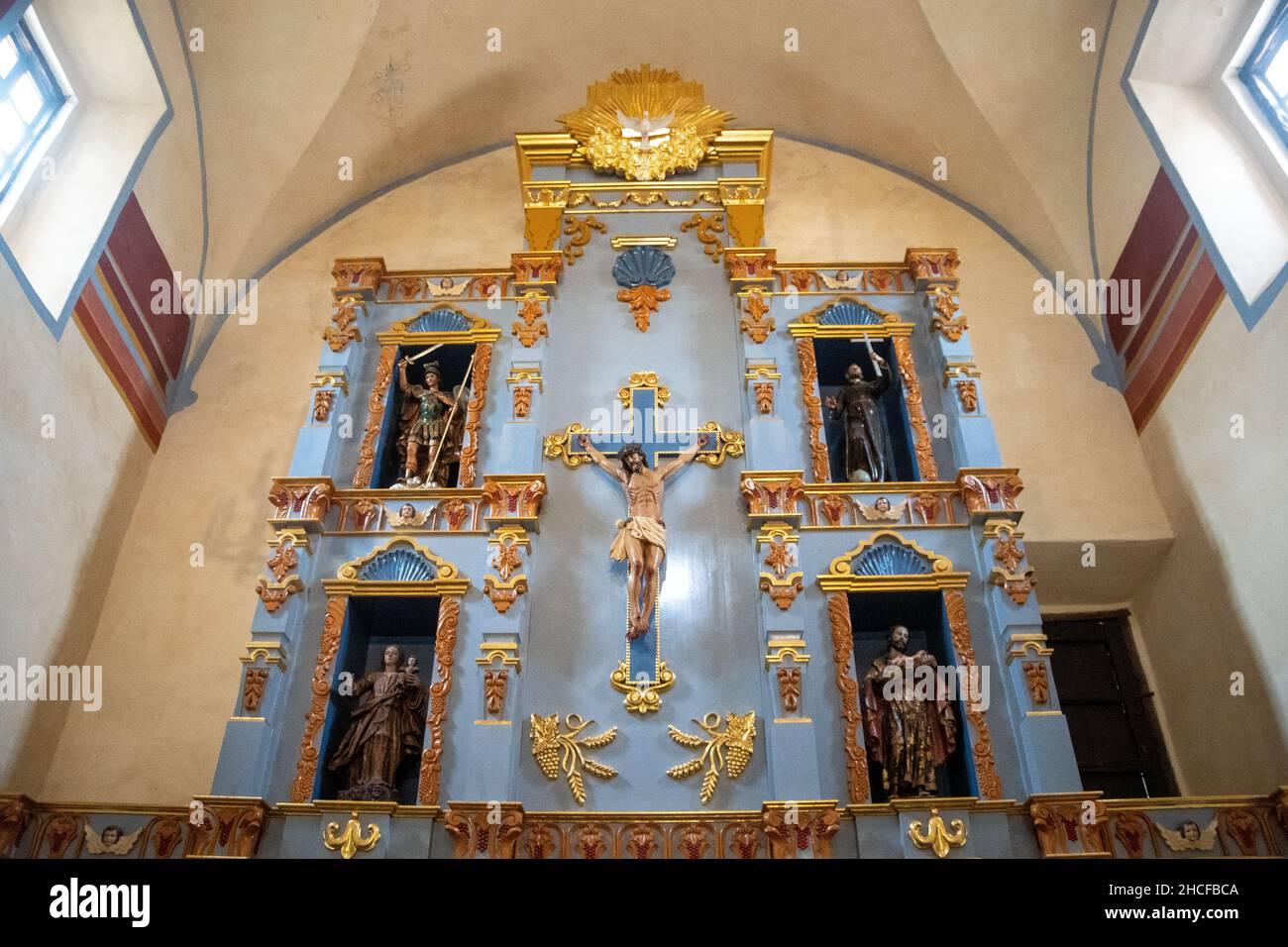 Detailed sculptures of religious figures at the front of a chapel Stock ...