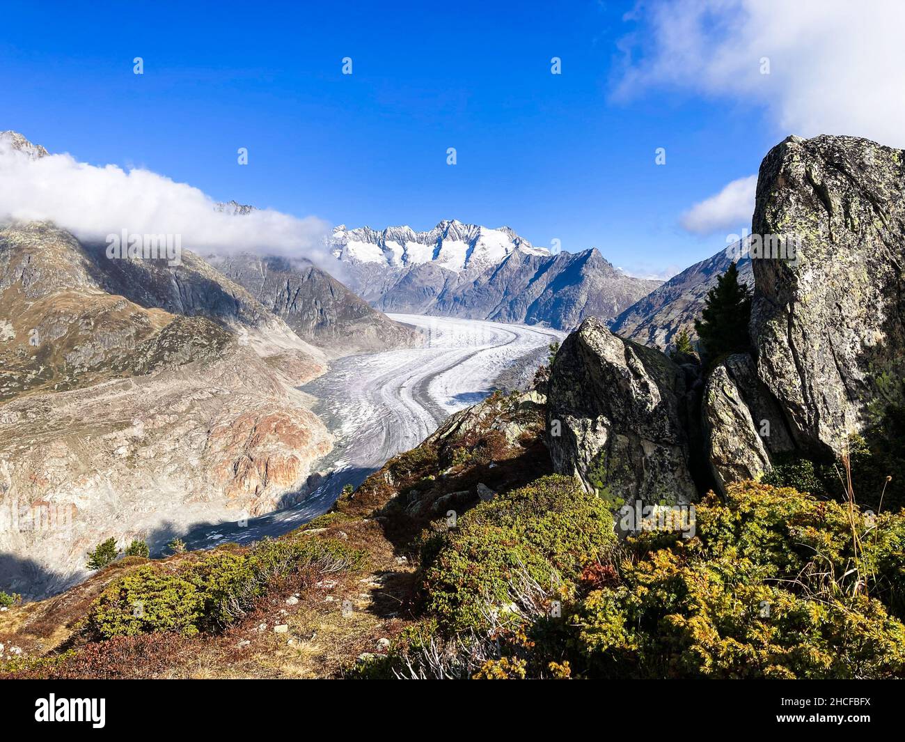 Impressive View to the Aletsch Glacier with blue cloudy sky, Aletsch ...
