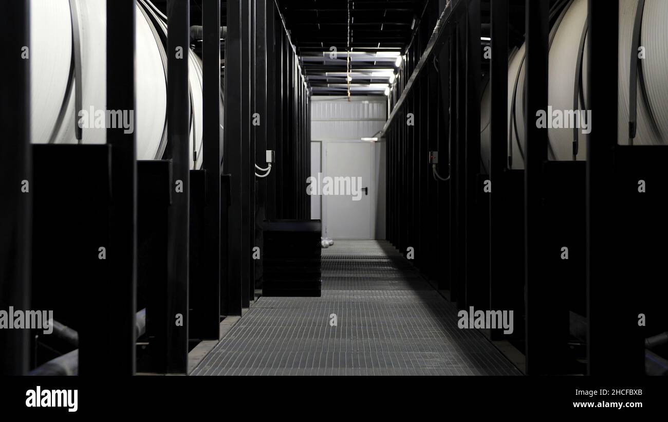 Factory equipment for water purification. Long dark corridor at the ...