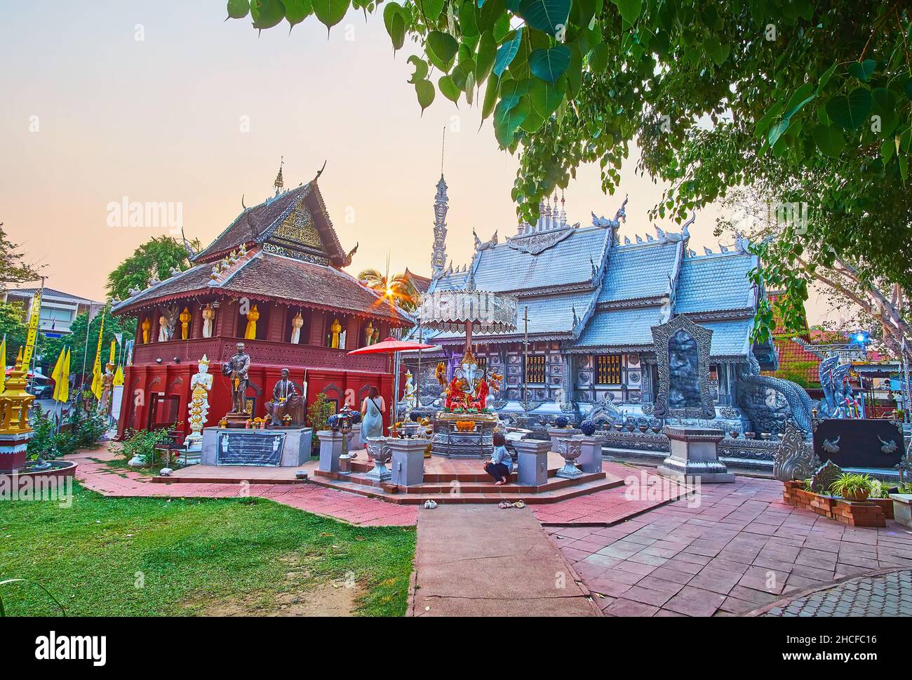 The sunset over the Silver Temple (Wat Sri Suphan) with ornate ...