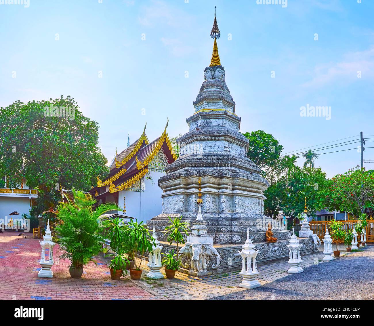 The masterpiece chedi of the old Wat Phan Waen temple with rich ...
