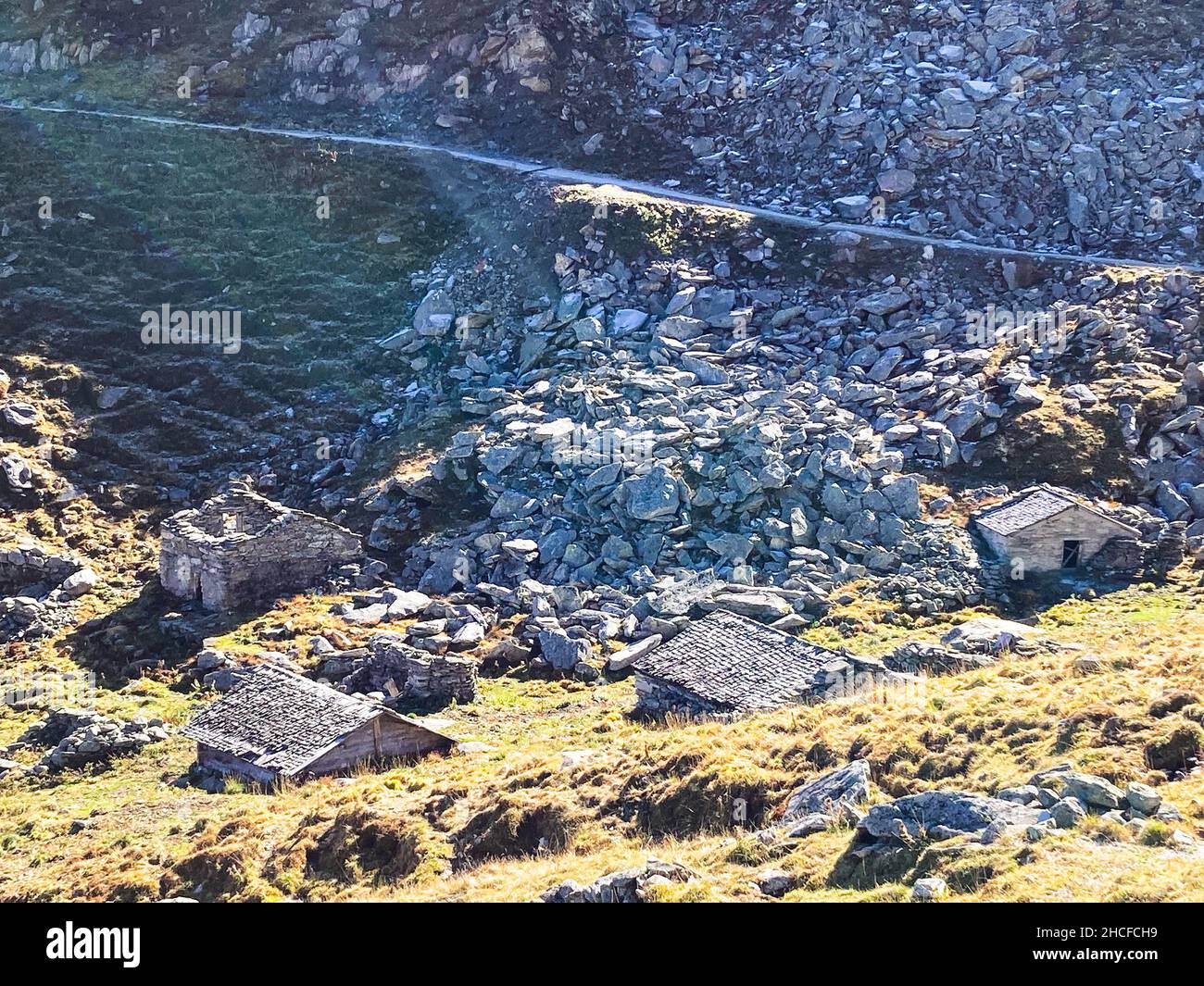 Ruins of old Stone Houses along a Hiking Way in the Aletsch Arena ...