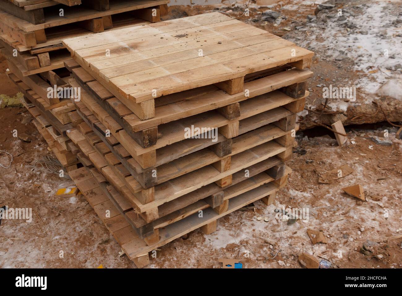 Stack wooden palle at a construction site. Empty wooden palle. Pallets ...