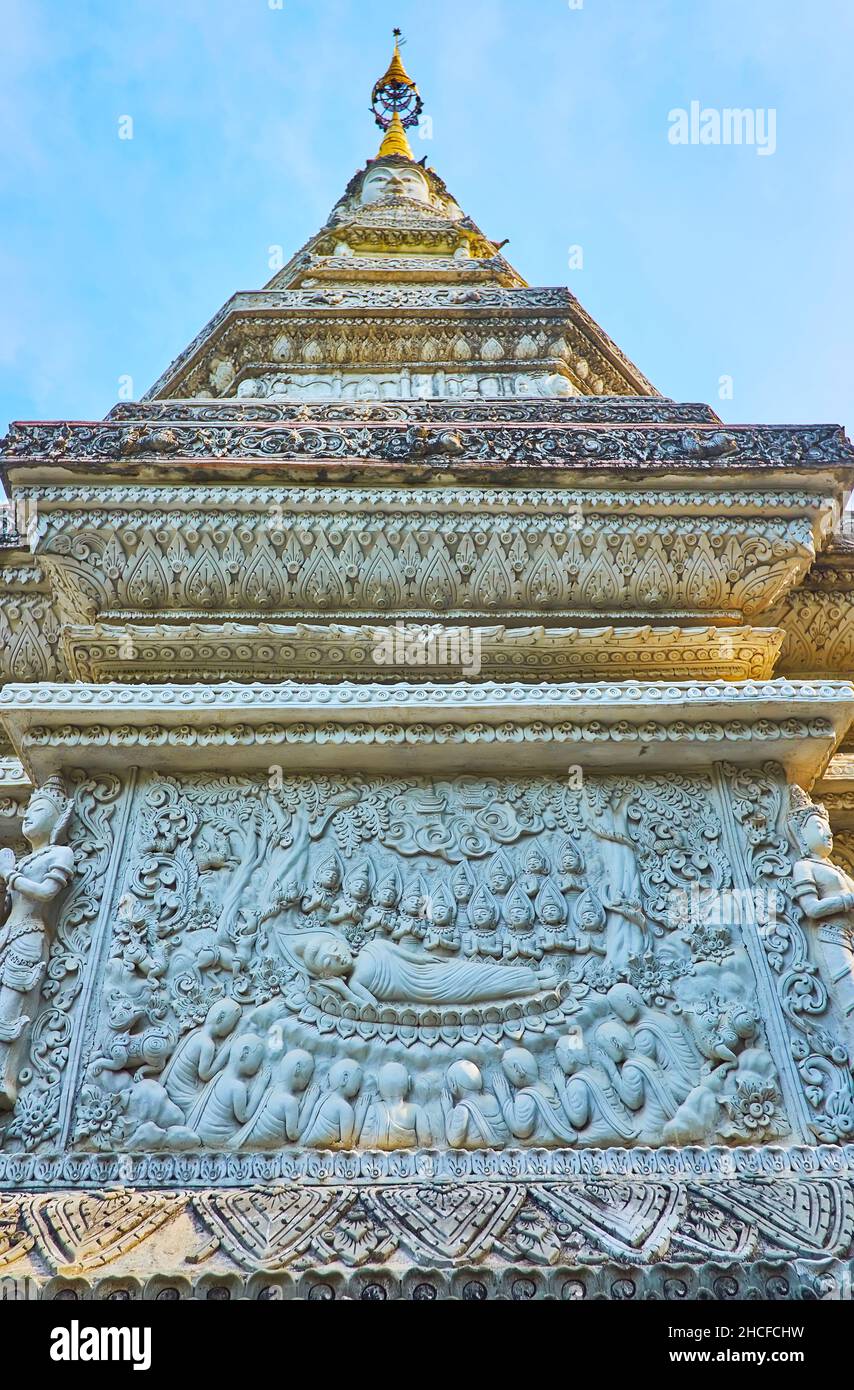 The unique octagonal chedi of Wat Phan Waen temple is richly decorated ...