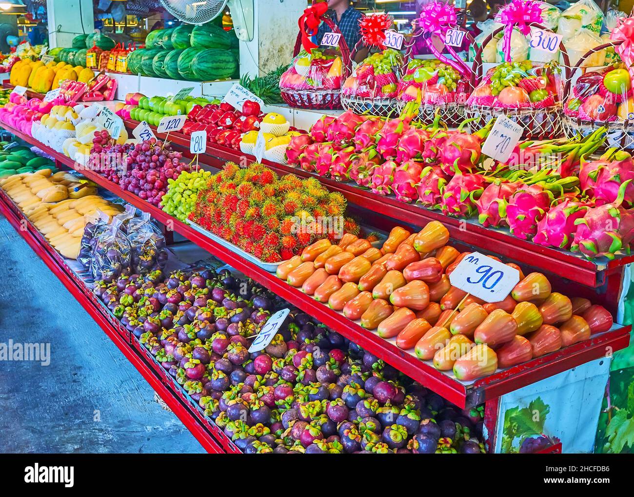 The stall's counter with wide range of tropic fruits - rose-apples ...