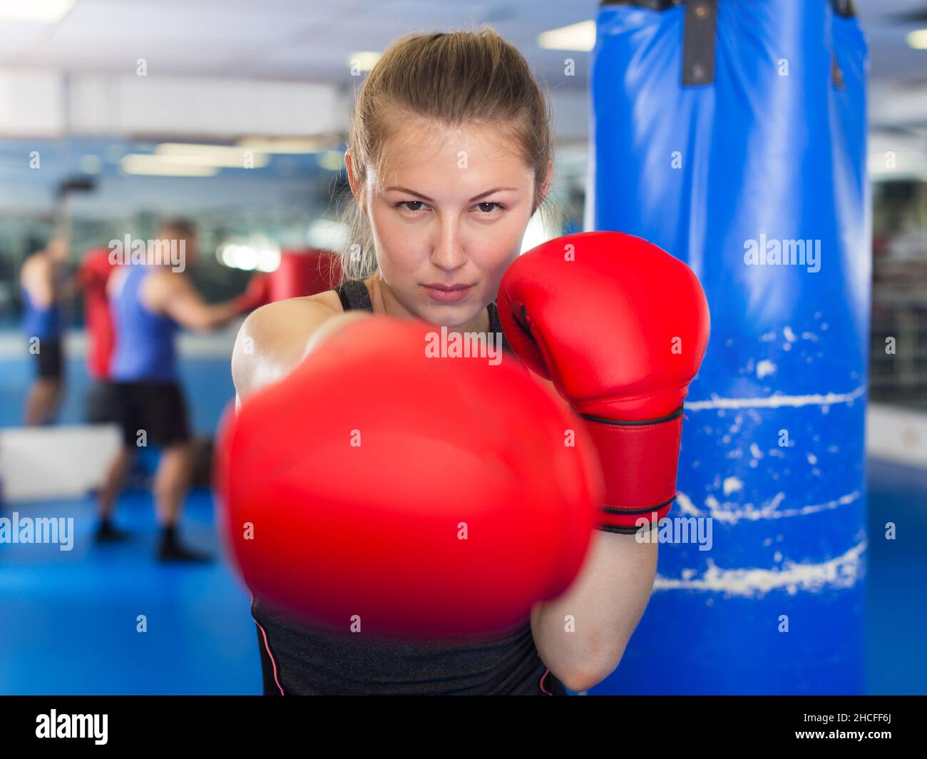Woman boxing in gym Stock Photo - Alamy