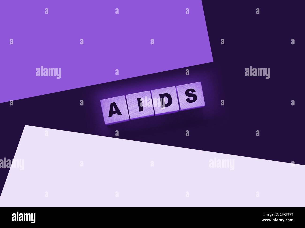 AIDS abbreviation written on wooden cubes. Healthcare concept. STD ...