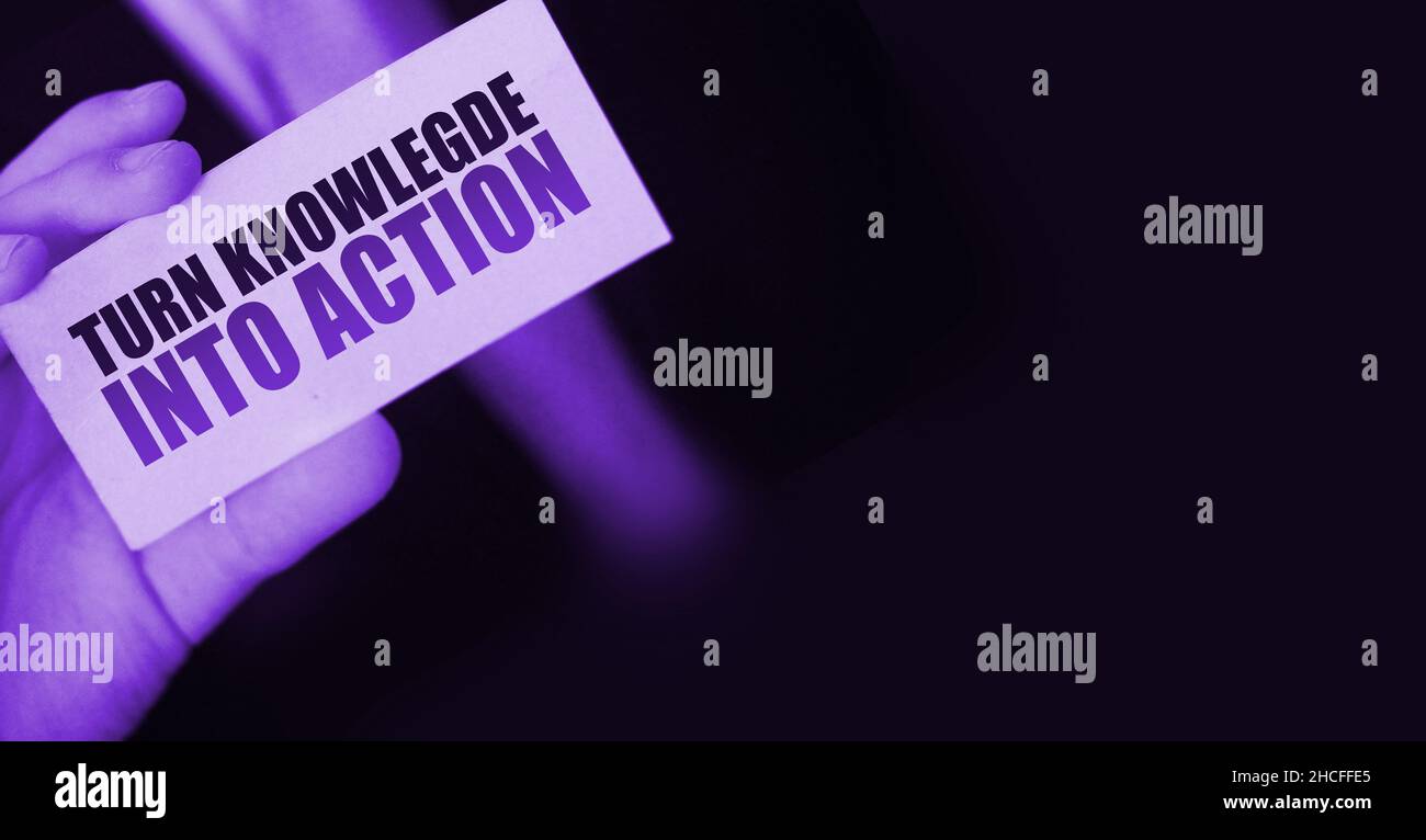 Turn Knowledge Into Action card in businessman hand. Business concept ...