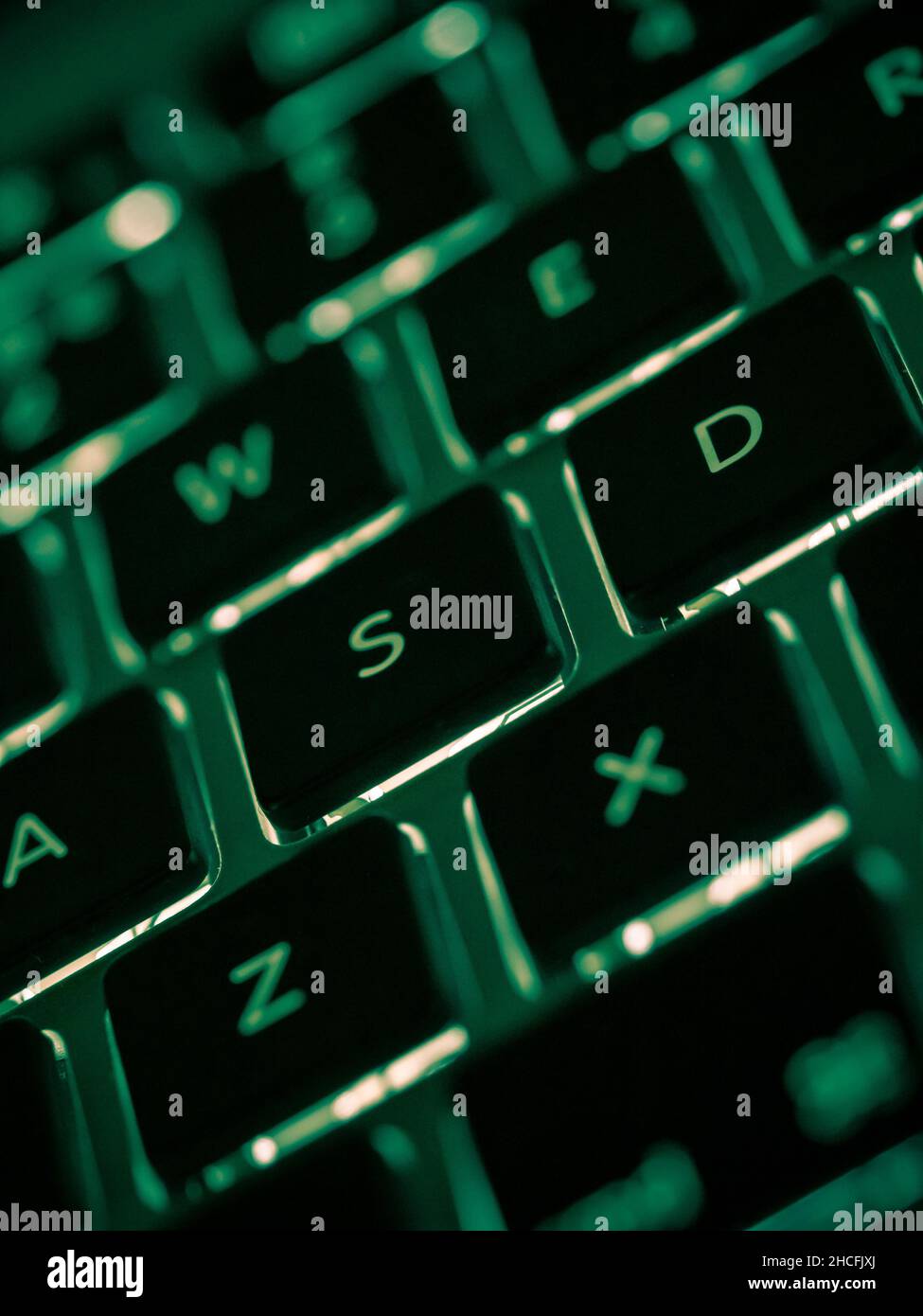 Angled view close up of illuminated keyboard on computer Stock Photo ...