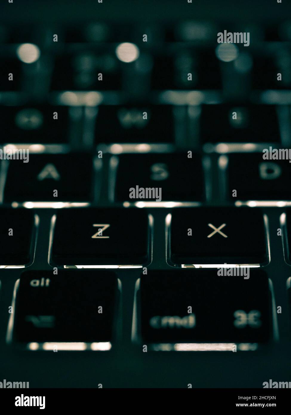 Close up of illuminated keyboard on computer Stock Photo - Alamy