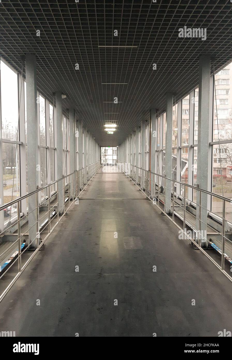 Empty corridor - overpass with high-tech glass and metal walls Stock ...
