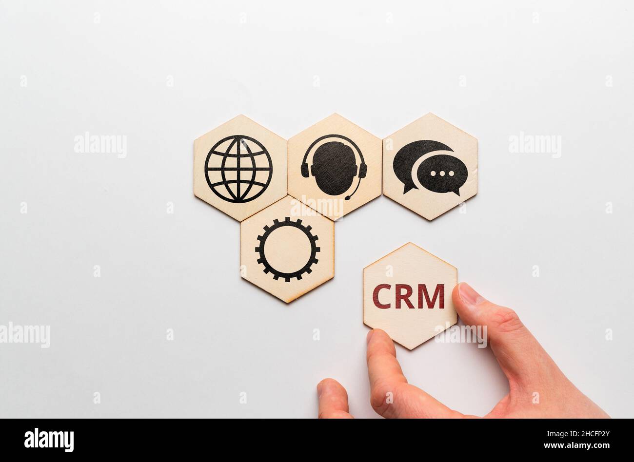 Concept CRM or Customer Relationship Management. Person with hand ...