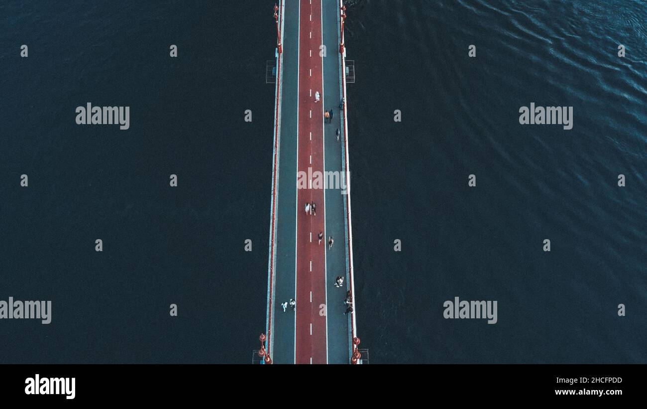 Beautiful aerial view of cars on a highway Darnytskyi bridge in the ...