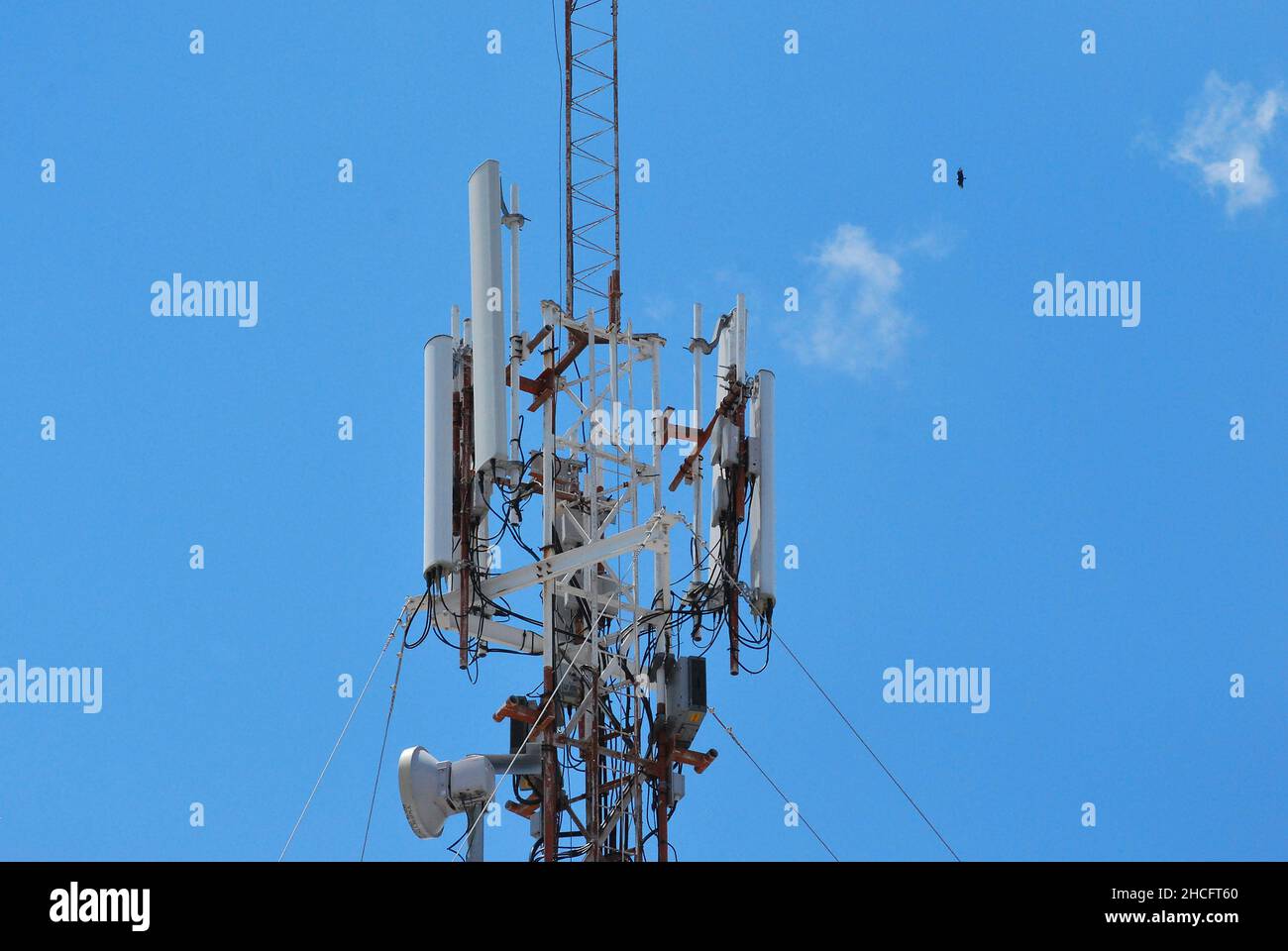 Communication antenna tower building with the blue sky background Stock ...
