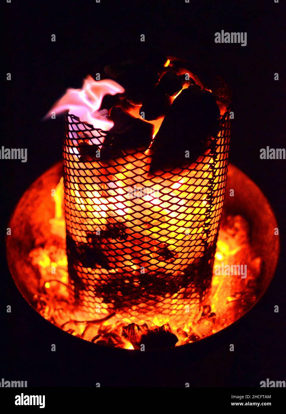 Closeup shot of a burning bonfire in a basket Stock Photo - Alamy