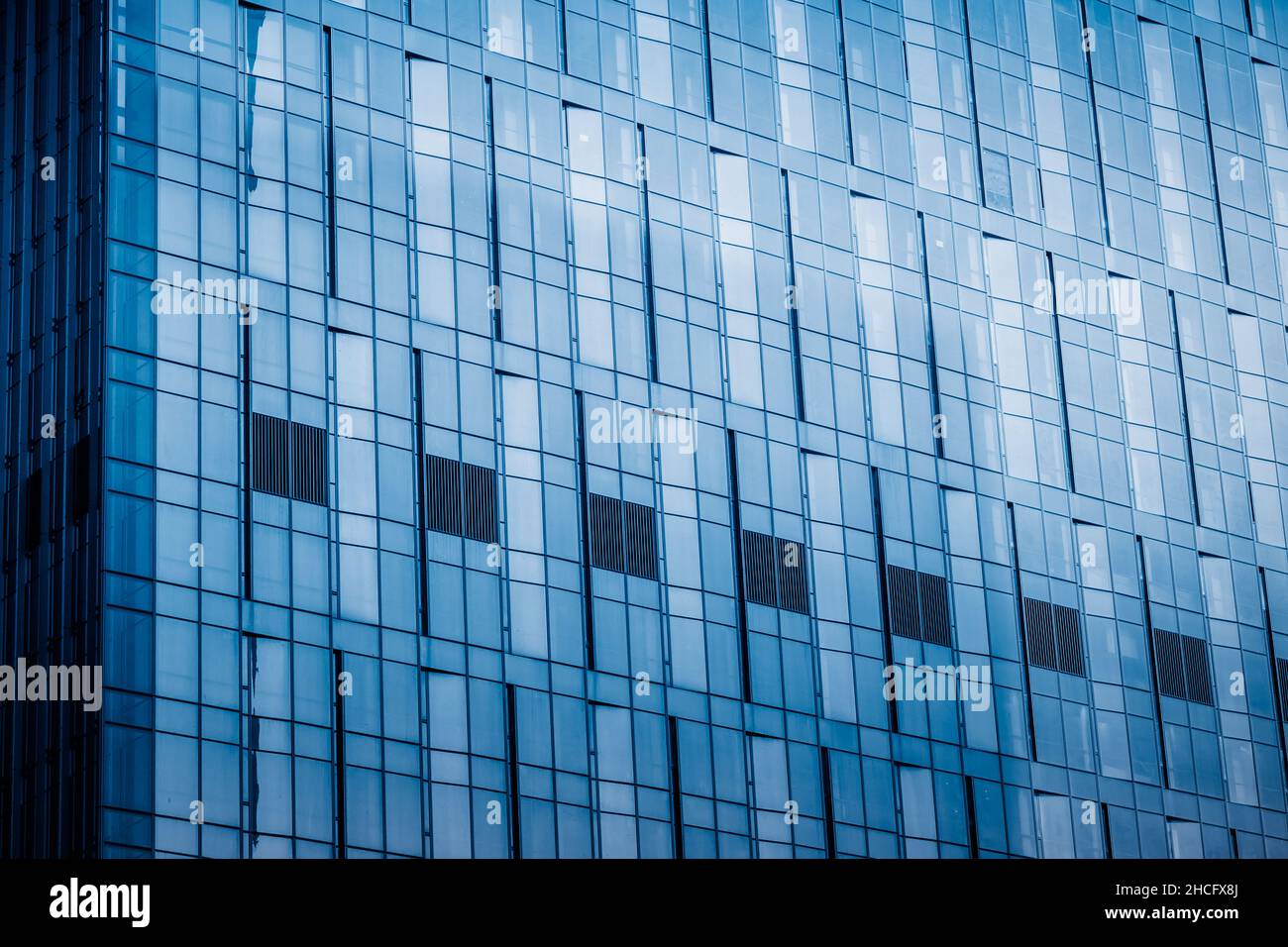Abstract building. blue glass wall of skyscraper Stock Photo - Alamy