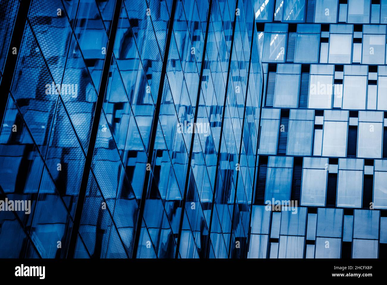 Abstract building. blue glass wall of skyscraper Stock Photo - Alamy