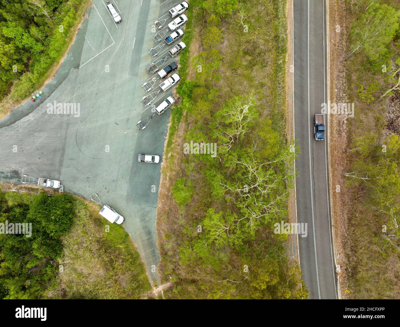 Car park at Conway Beach filled with cars and boat trailers after ...