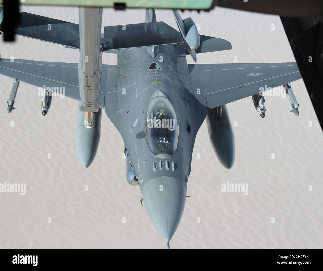 An F-16 Fighting Falcon from the 176th Expeditionary Fighter Squadron ...