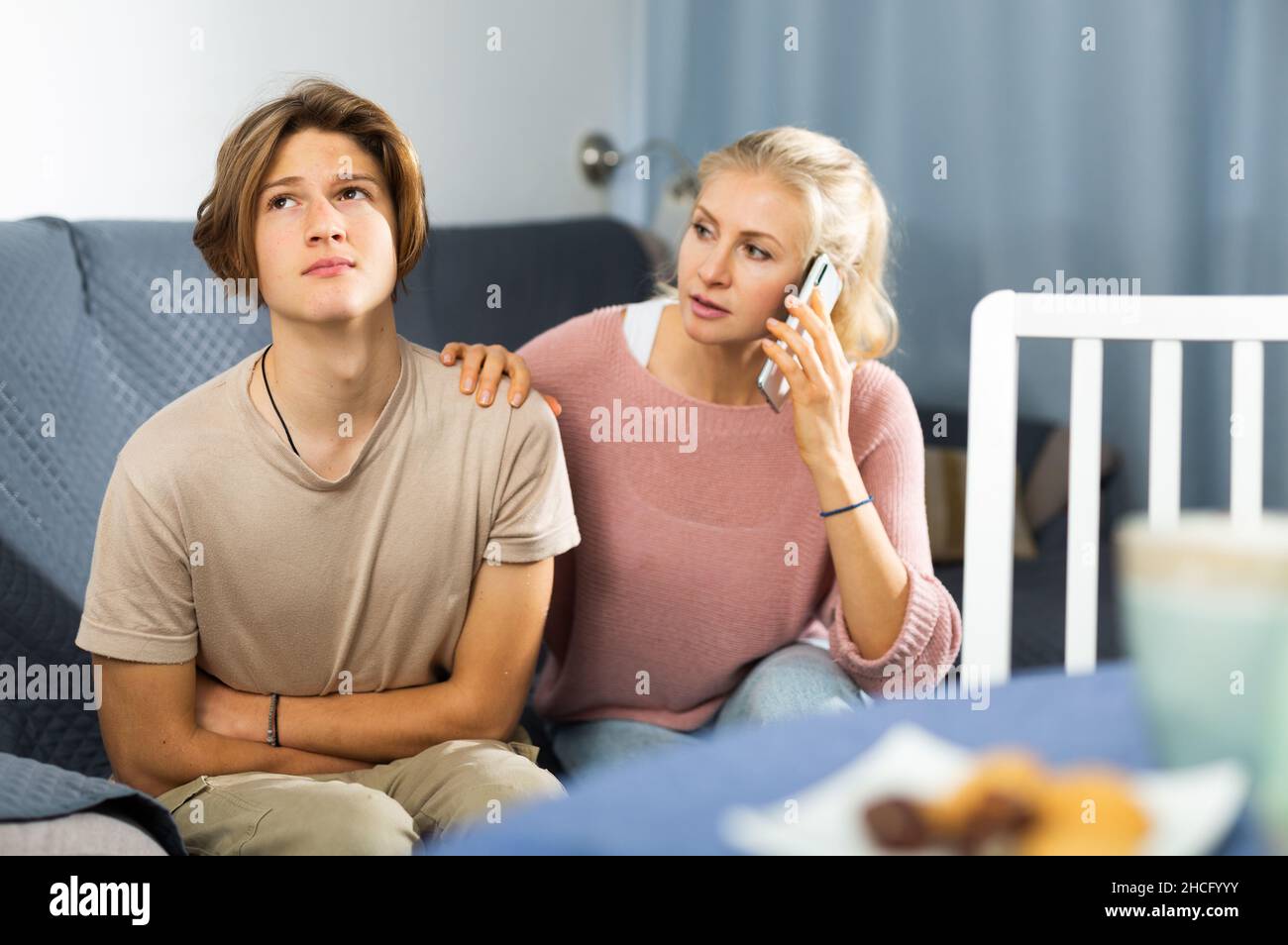 Doctor talking child sad hi-res stock photography and images - Alamy