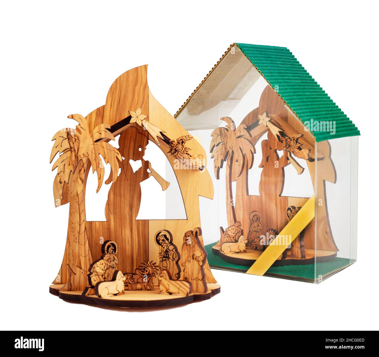 Carved wooden Nativity scene with Jesus in box isolated on white ...