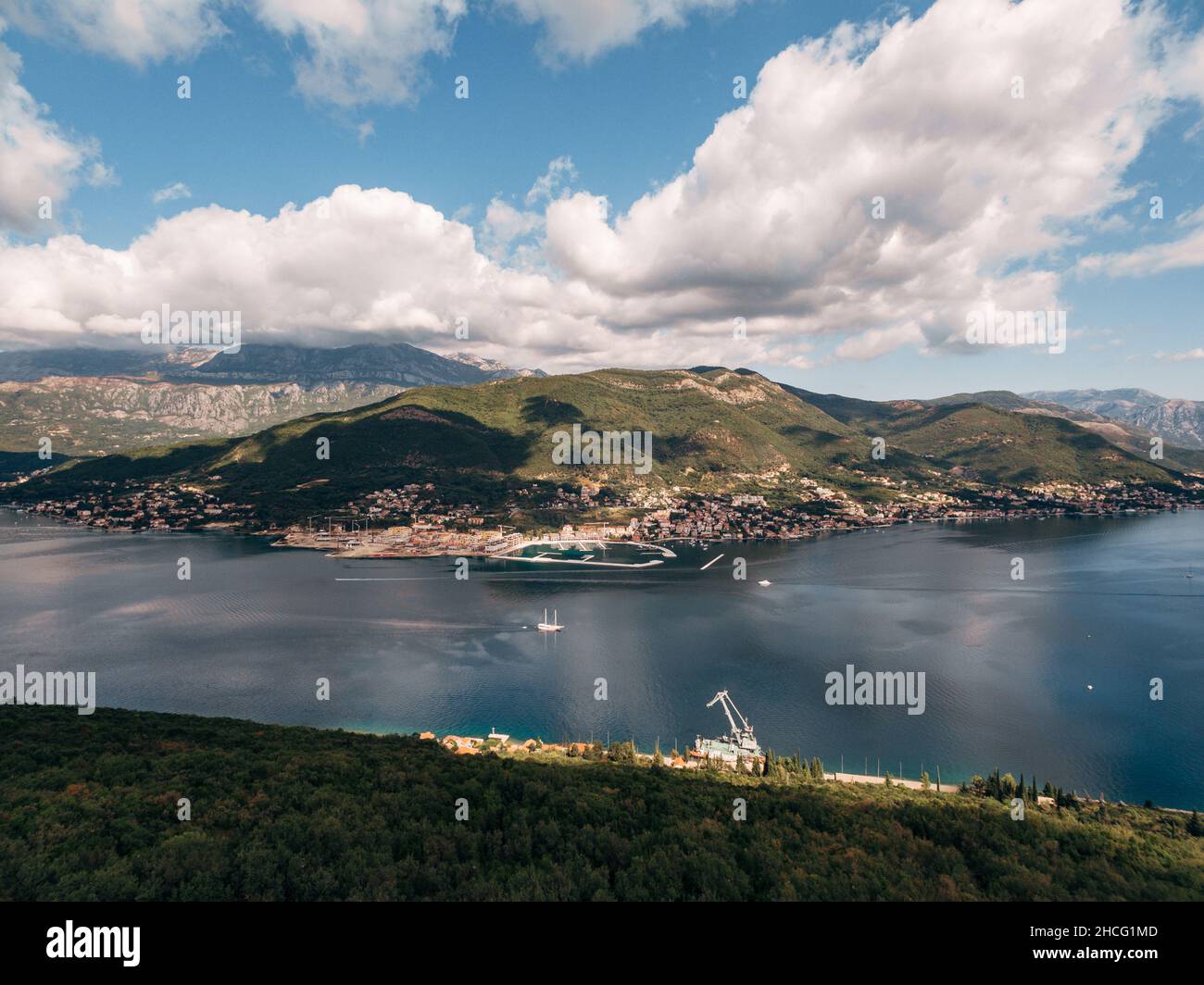 Aerial view of the Porto Novi resort at the foot of the mountains ...