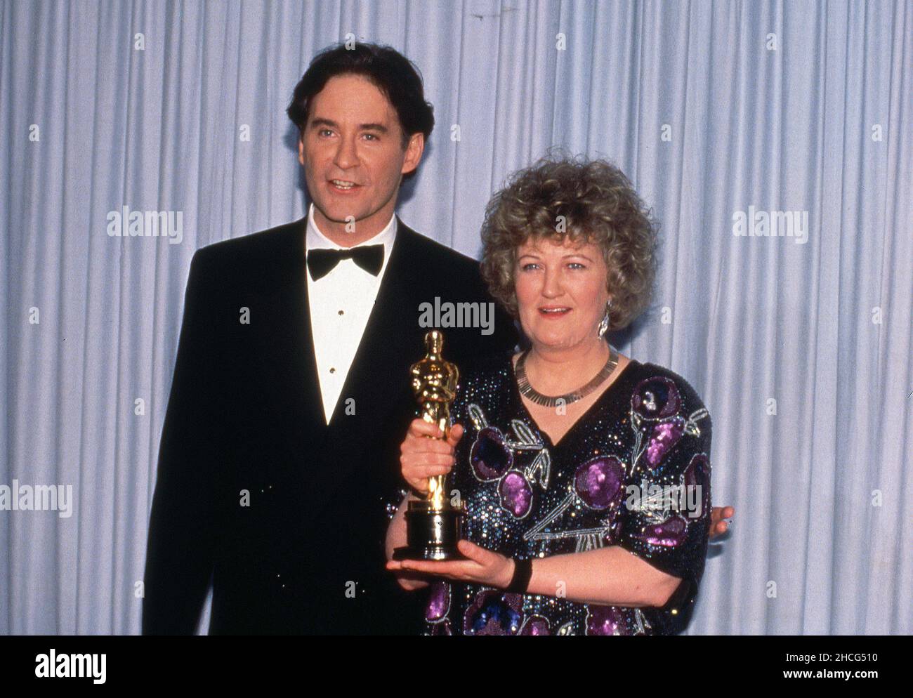 Kevin Kline and Brenda Fricker at the 62nd Academy Awards ceremony ...