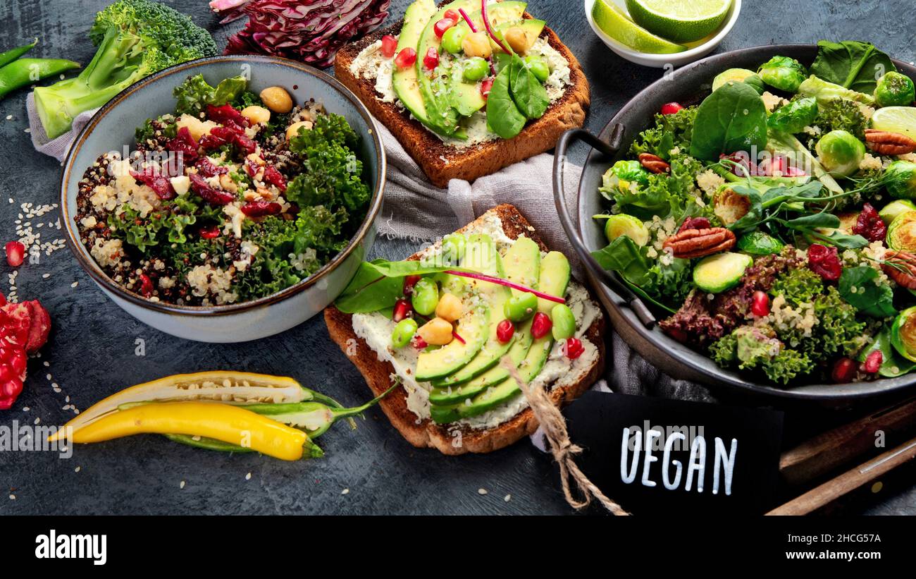 Vegan dishes assortment on gray background Stock Photo - Alamy