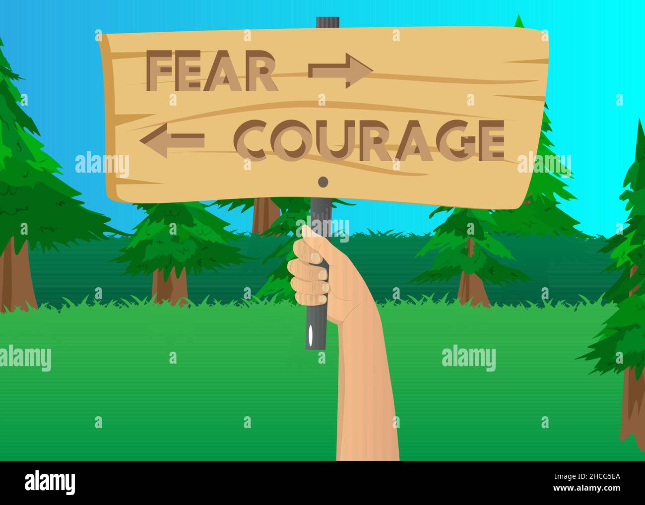 Hand holding up a banner with Courage and fear text with arrows. Man ...