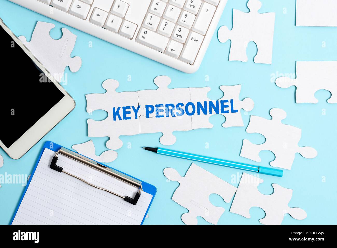 Text caption presenting Key Personnel. Conceptual photo Program ...