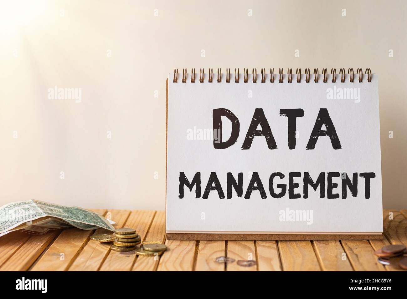 Hand writing sign Data Management. Word for The practice of organizing and maintaining data ...