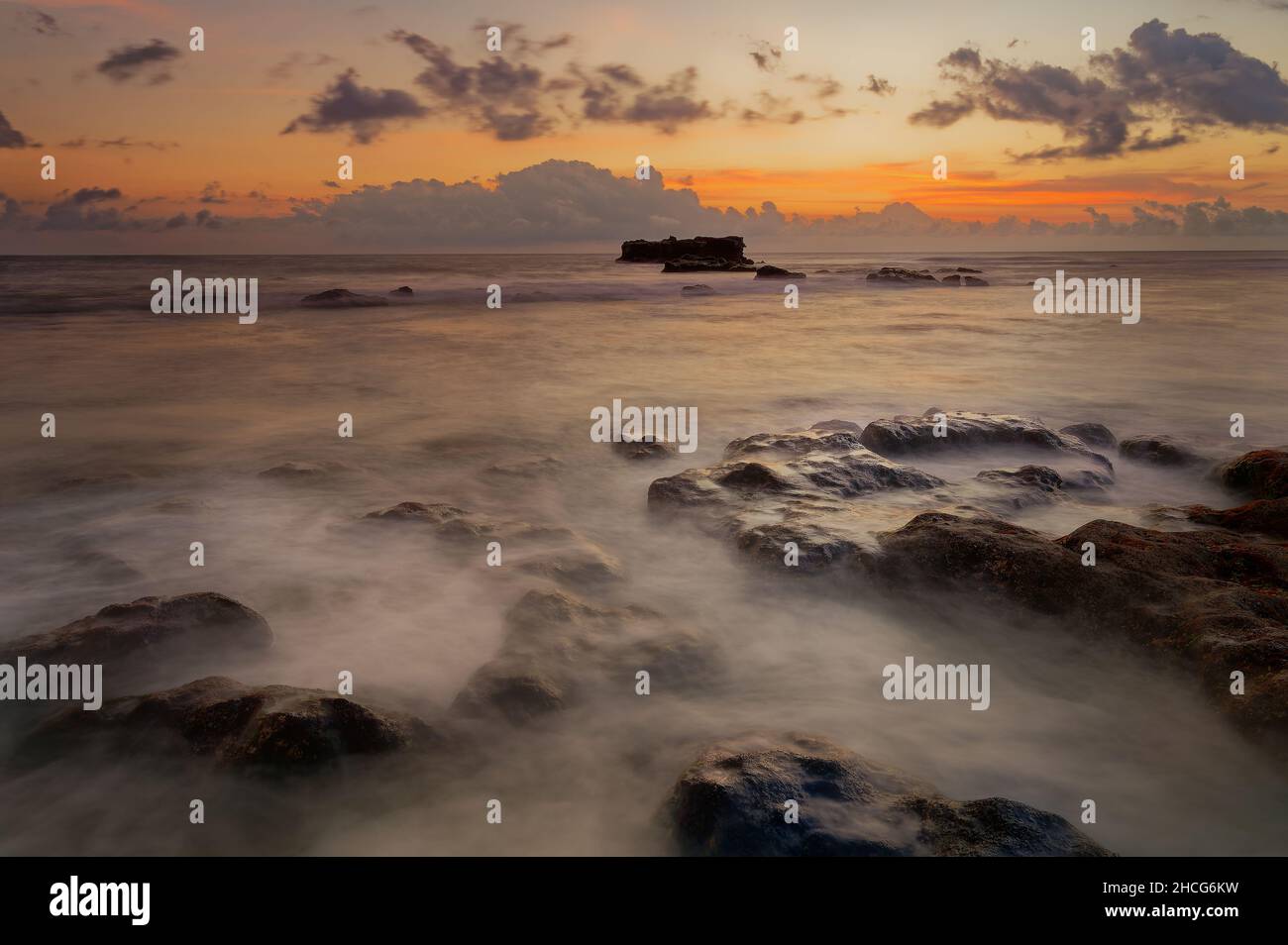 Amazing sunset in the Bali sky , with orange colored sun rays , on this ...