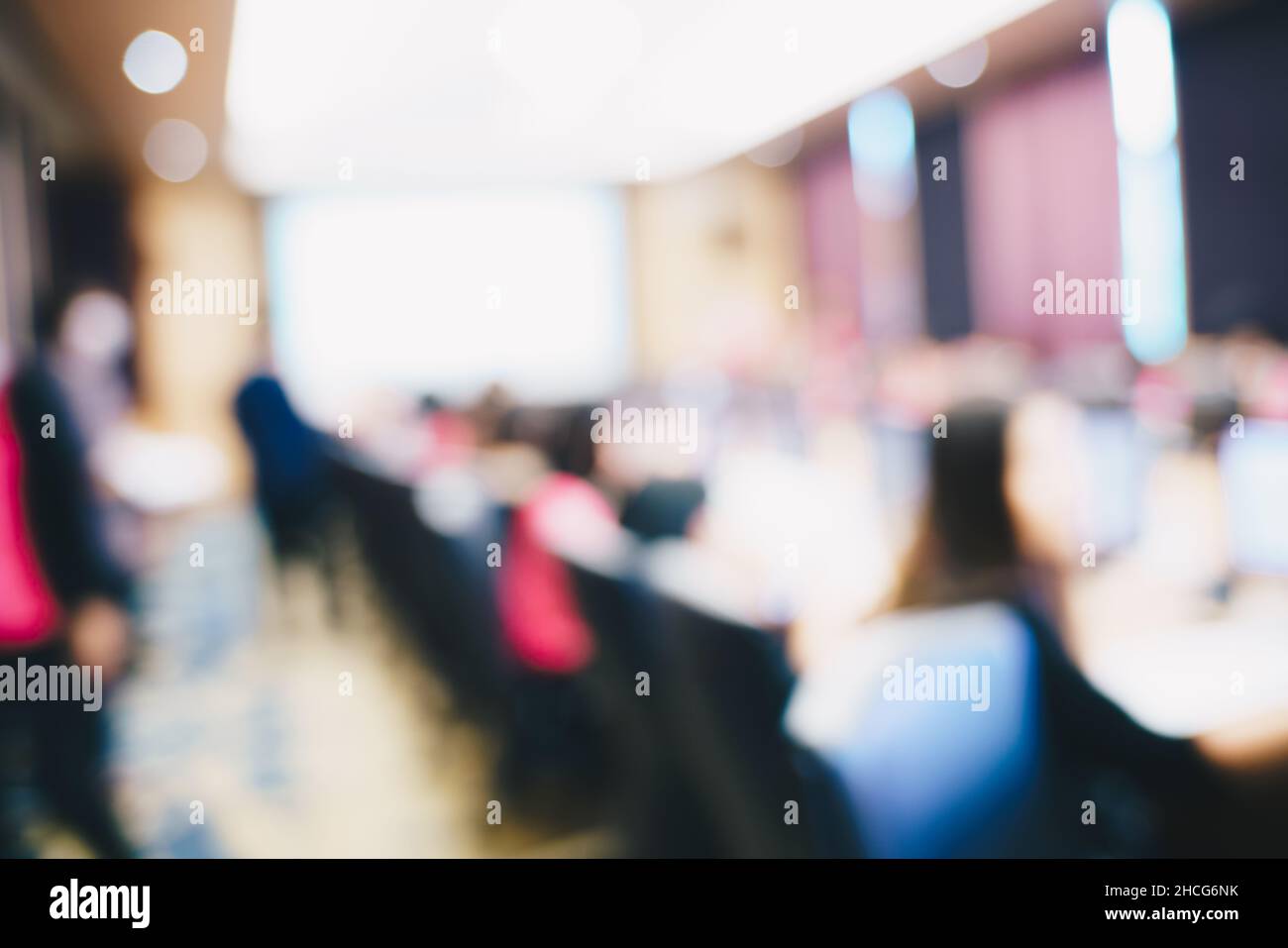 Blurred people sitting in seminar hall room business education Stock ...