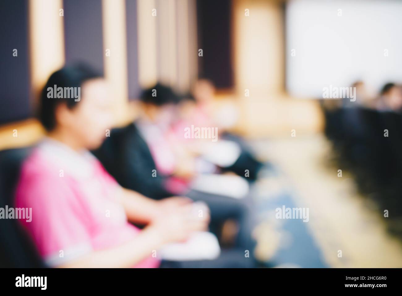 Blurred people sitting in seminar hall room business education Stock ...