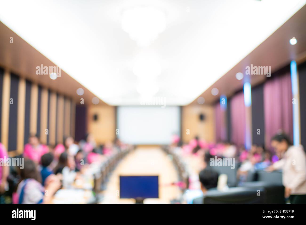 Blurred people sitting in seminar hall room business education Stock ...