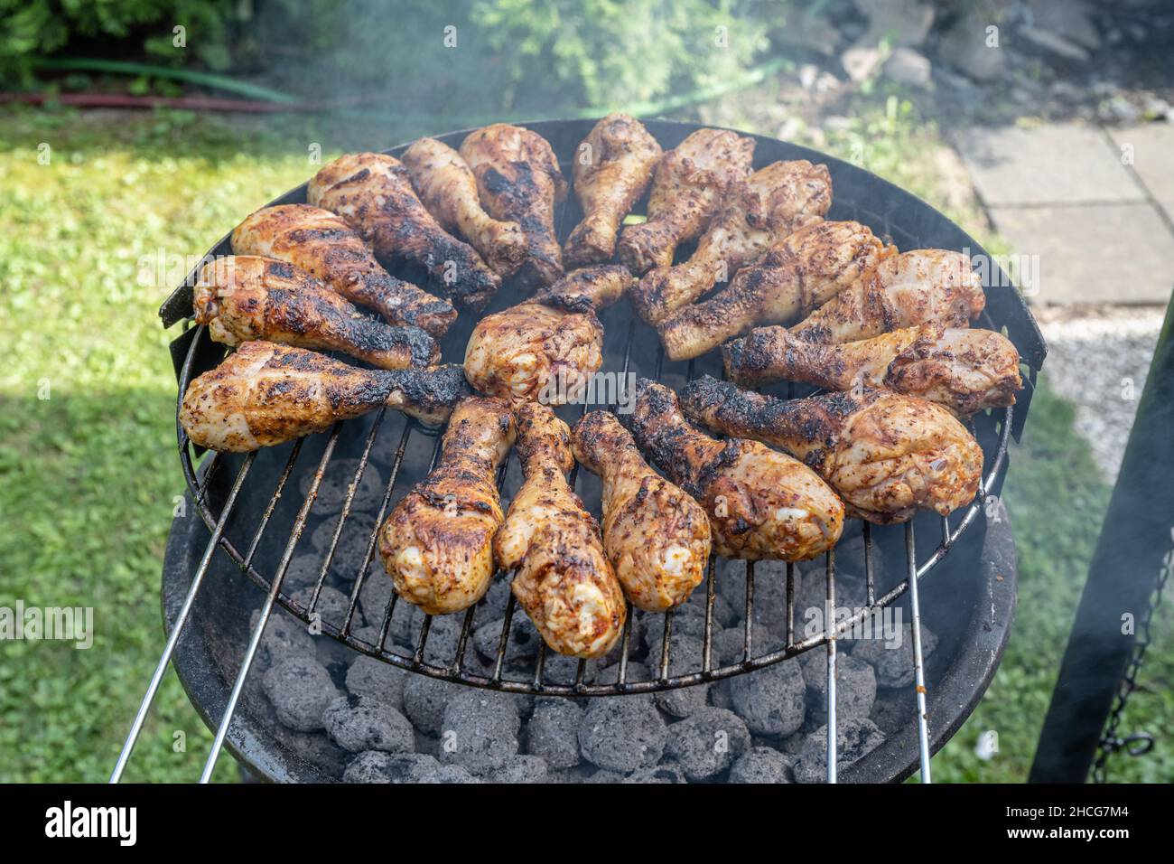 Cooking barbecue chicken wings coal on grill glowing coals bbq in the ...