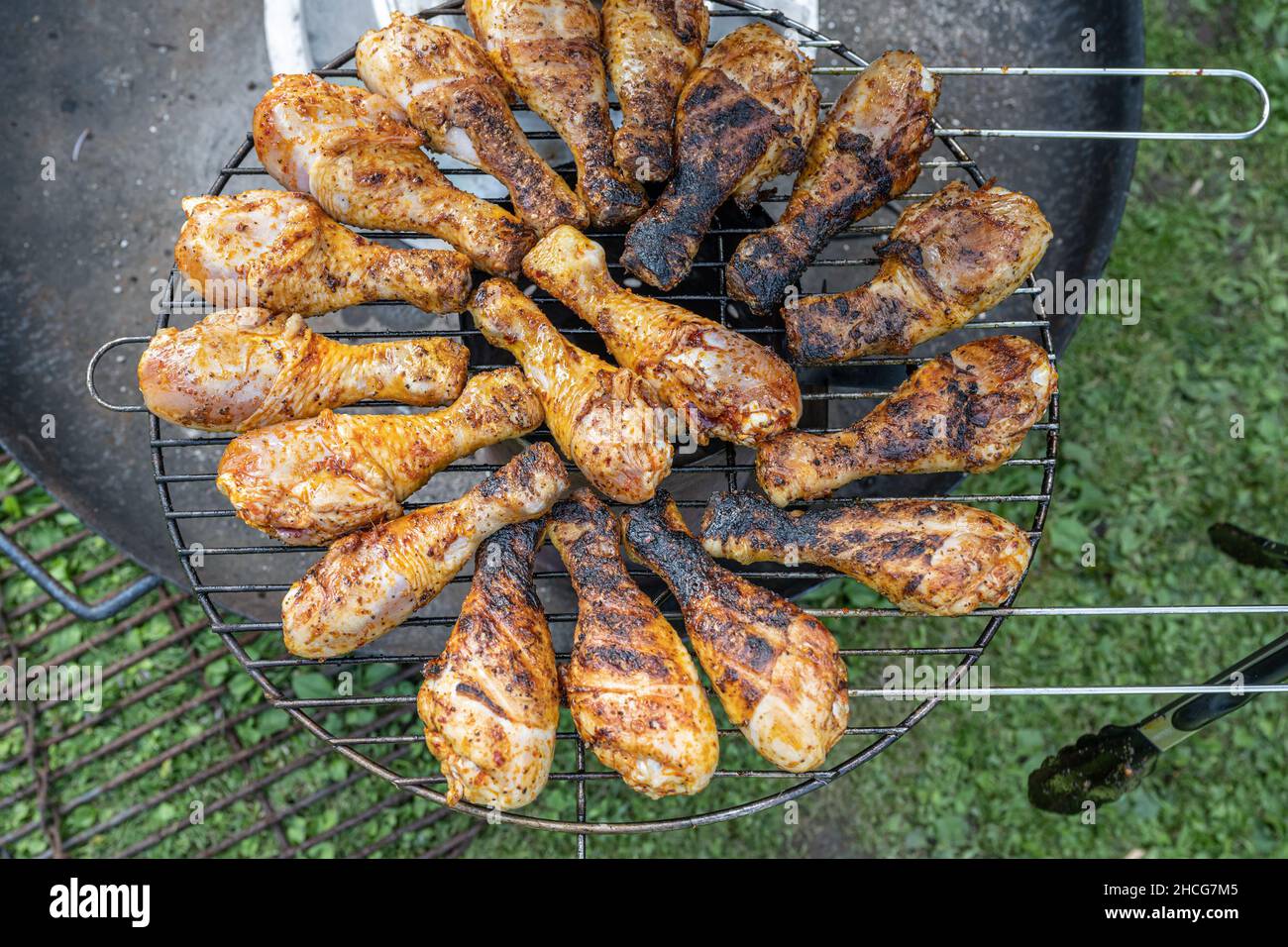 Cooking barbecue chicken wings coal on grill glowing coals bbq in the ...