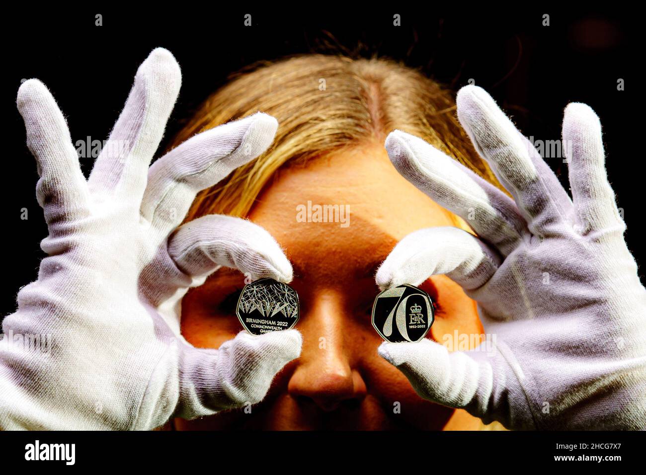 Beth Perry holding a Birmingham 2022 Commonwealth Games 50p coin (left ...