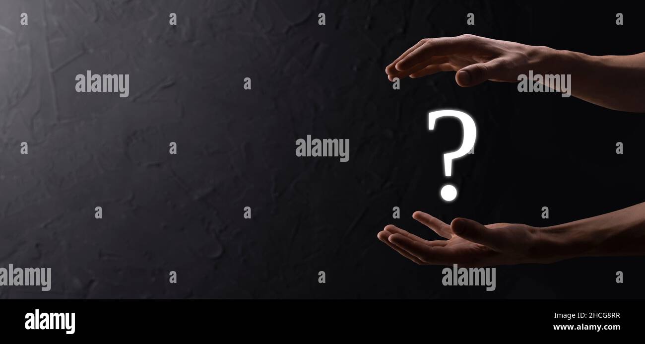Businessman man hand hold interface question marks sign web. Ask ...