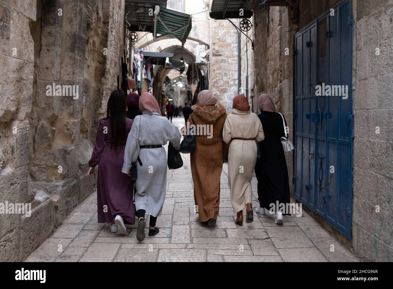 Palestinian women walk in Al Wad street which Israelis call Haggai in ...
